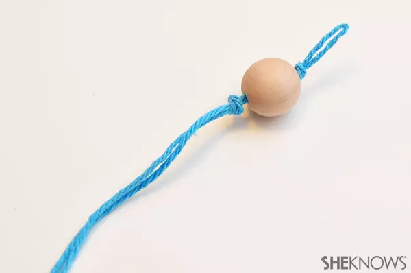 Juguete de cuerda para escalar | sheknows.com - paso cinco